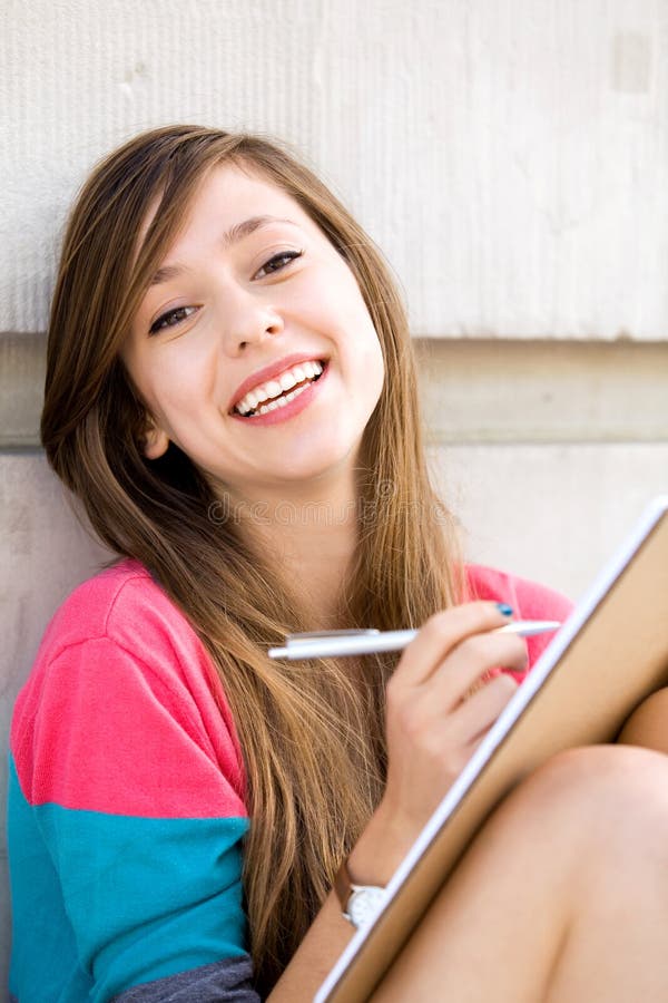 Teenage girl writing stock image. Image of exercise, female - 21262813