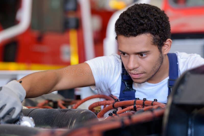 Teenage Male Mechanic at Work Stock Image - Image of worker, dungarees ...