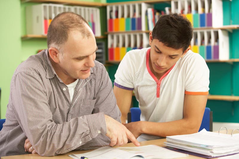 Teenage Student in Classroom with Tutor Stock Image - Image of lecturer ...