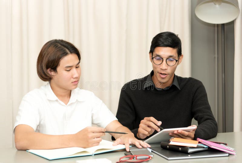 Teenage Student in Classroom with Tutor Stock Image - Image of academic ...
