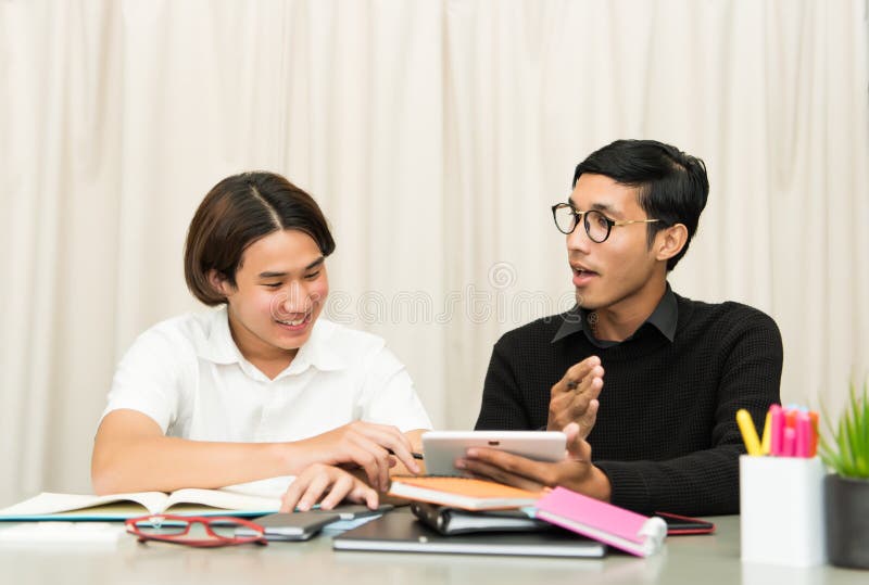 Teenage Student in Classroom with Tutor Stock Photo - Image of people ...