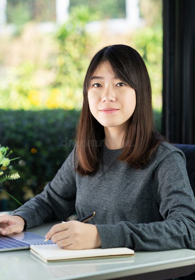 Teenage Student Using Laptop Doing Homework at Home Stock Image - Image ...