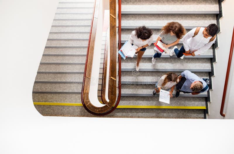 Teenage Students on Stairs in High School. Stock Photo - Image of ...