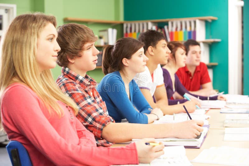 Teenage Students Studying in Classroom Stock Image - Image of sitting ...