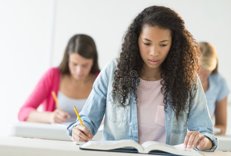 Black African American Young Girl Student Studying at the School ...