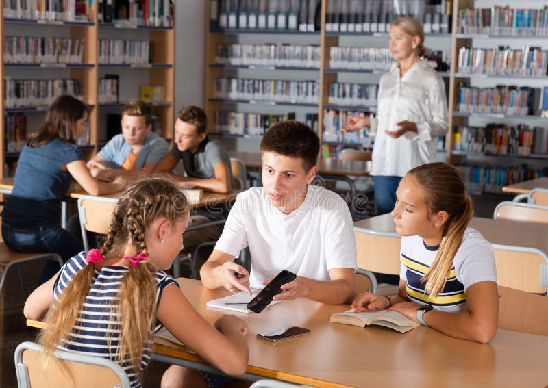 Teenage Students Working in Groups Stock Photo - Image of game, child ...