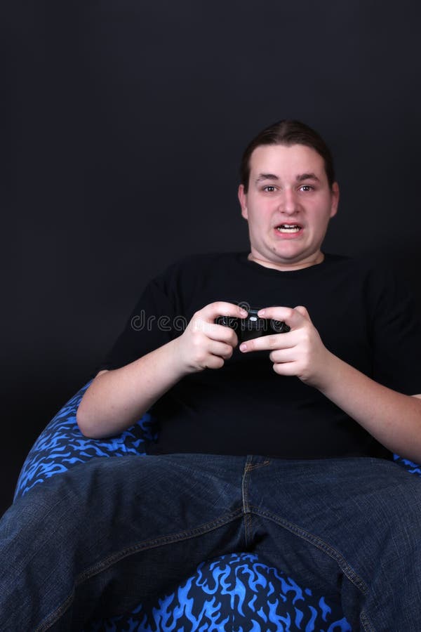 Boy Playing Video Game stock image. Image of mood, scowl - 1007523