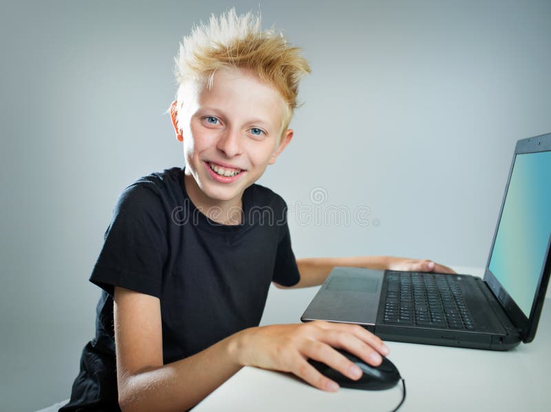 Sad Teenager behind Laptop stock image. Image of network - 37897471