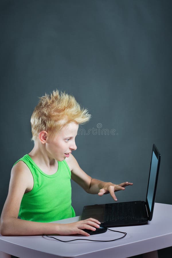 Teenager behind a computer stock photo. Image of teenage - 56759582