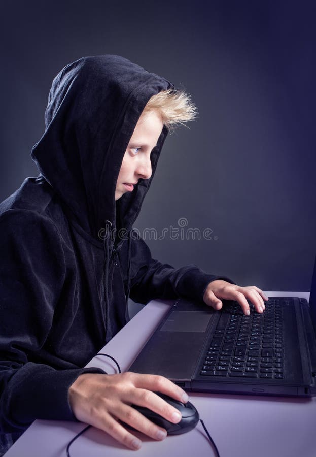 Sad Teenager behind Laptop stock image. Image of network - 37897471
