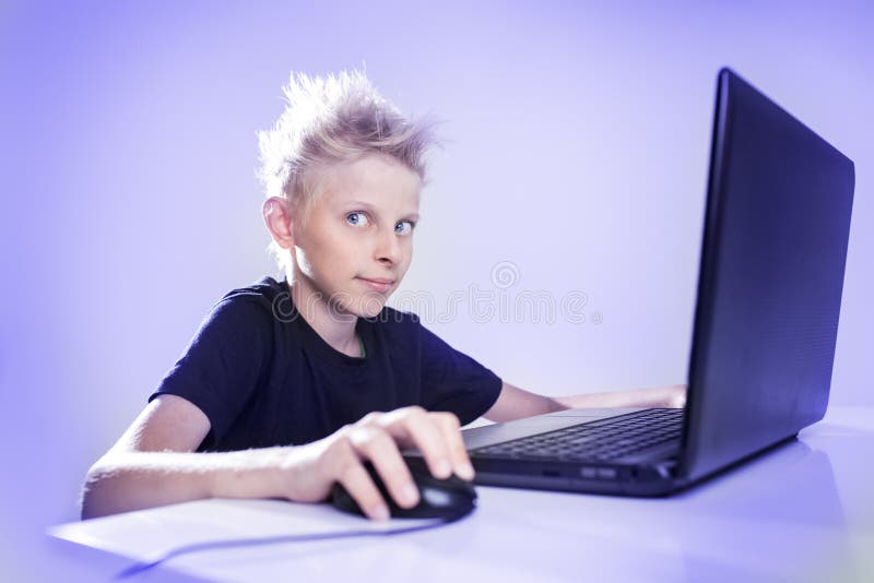 Teenager behind a computer stock image. Image of male - 57536351