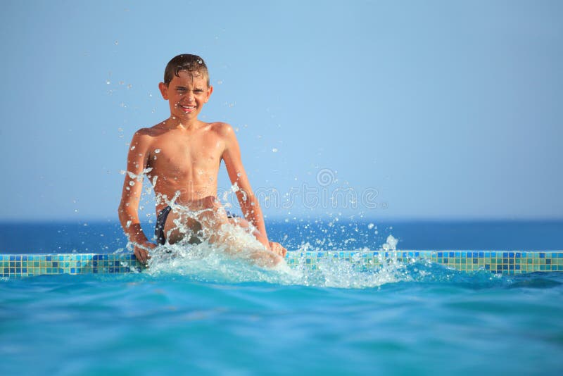 Teenager Boy Going Near Pool Pool Against Sea Stock Photo - Image of ...