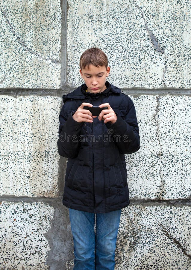 Teenager with Cellphone stock photo. Image of cellular - 63114488