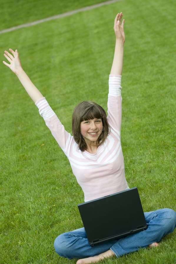 Teenager with Computer on the Grass Stock Image - Image of grass, green ...