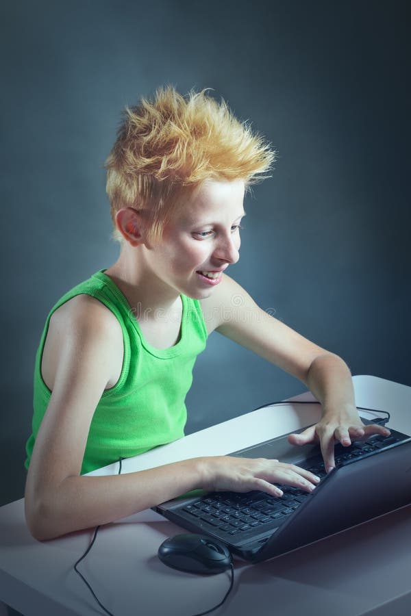 Teenager at a computer stock photo. Image of lifestyle - 56759728