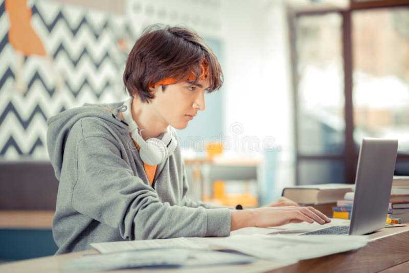 Teenager Doing His Hometask Using the Computer Stock Photo - Image of ...