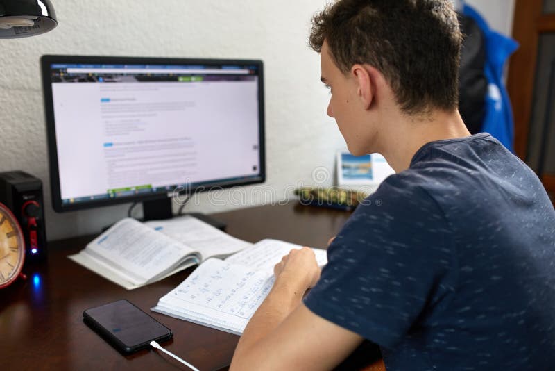 Teenager Doing Homework with Computer Stock Image - Image of school ...