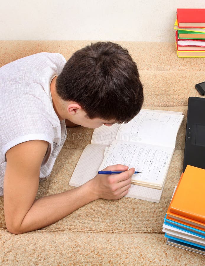 Teenager doing Homework stock photo. Image of read, interior - 72142204