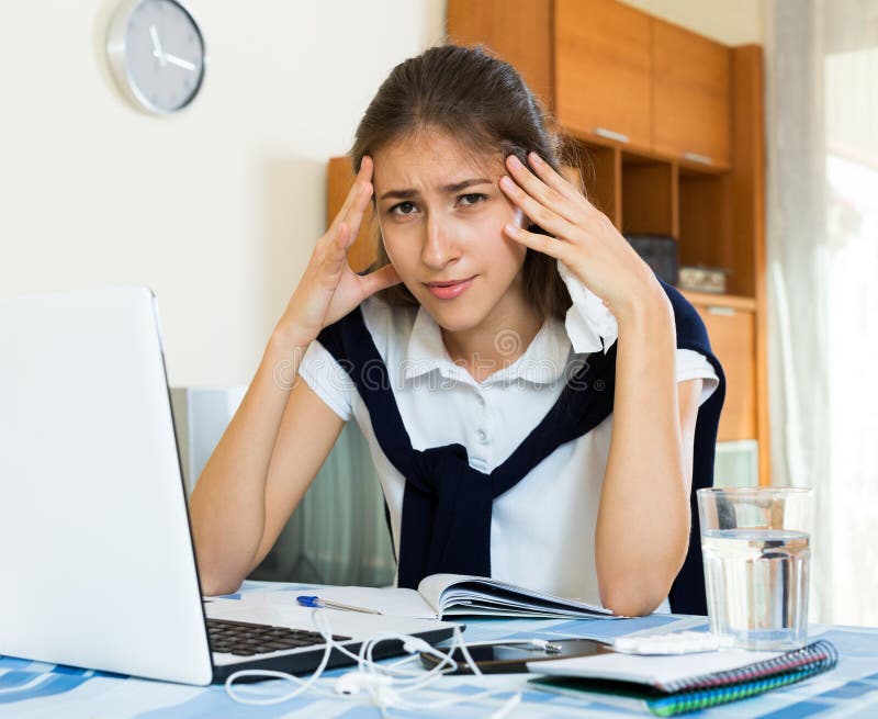 Teenager doing homework stock image. Image of female - 66253659