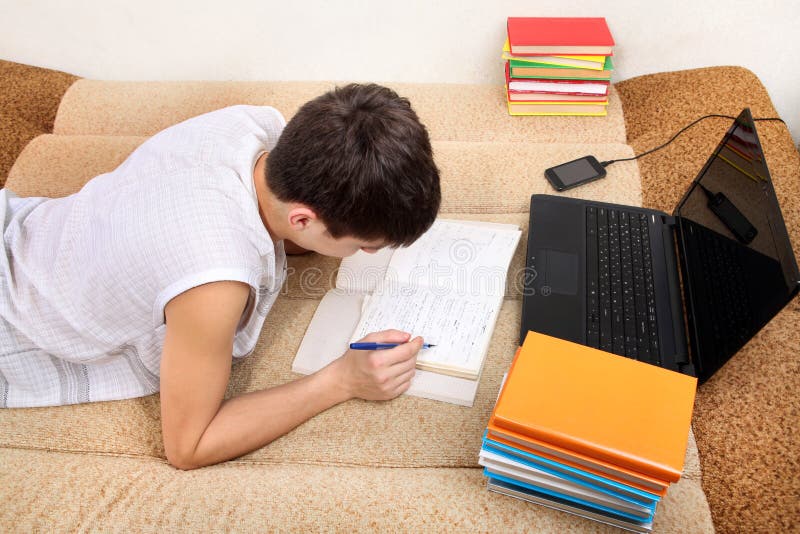 Teenager doing Homework stock image. Image of process - 40986417
