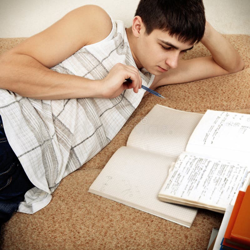 Teenager doing Homework stock image. Image of homework - 50953751
