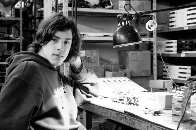 Teenager doing tech job stock photo. Image of connector - 7237428