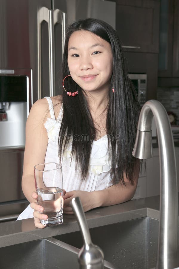 Teenager Girl Drinking Water in the Kitchen Stock Photo - Image of cool ...