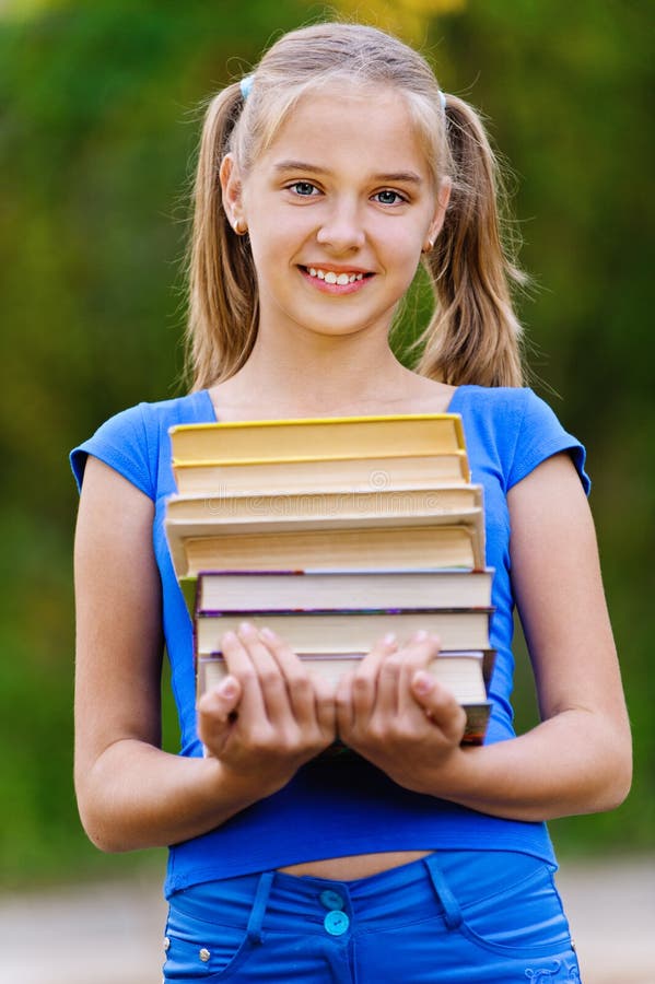 Teenager Girl Holding Stack Stock Photo - Image of child, literature ...