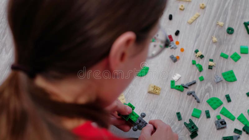 Teenager with Hands Constructs Elements from Back View Stock Video ...