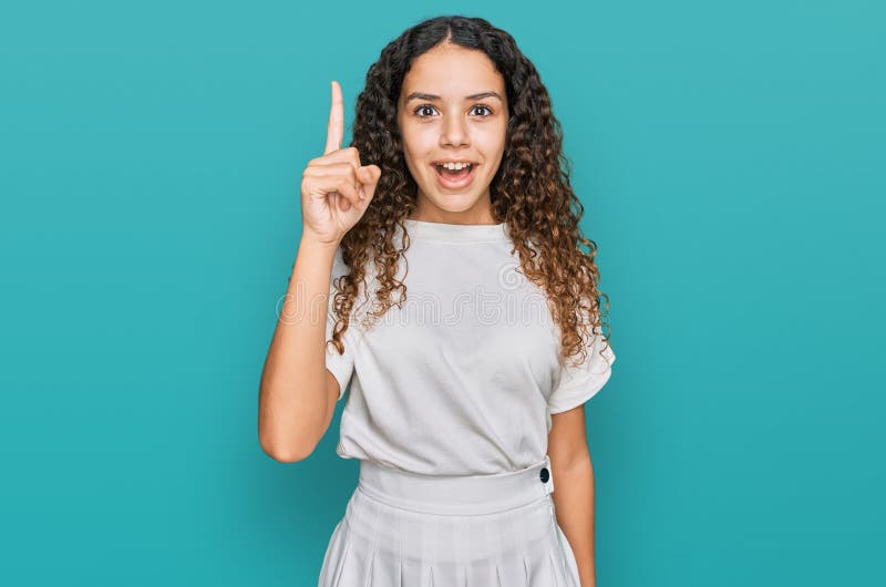 Teenager Hispanic Girl Wearing Casual White T Shirt Pointing Finger Up