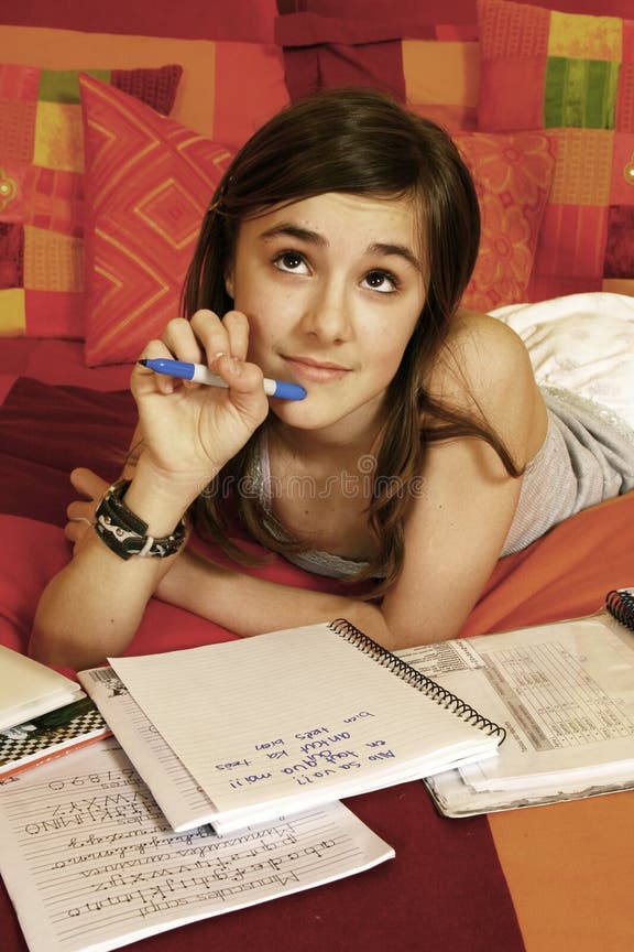 Teenager with homework stock photo. Image of thoughtful - 8833234
