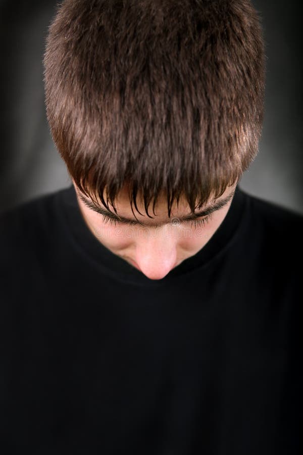 Teenager with Lowered Head stock photo. Image of male - 29400746