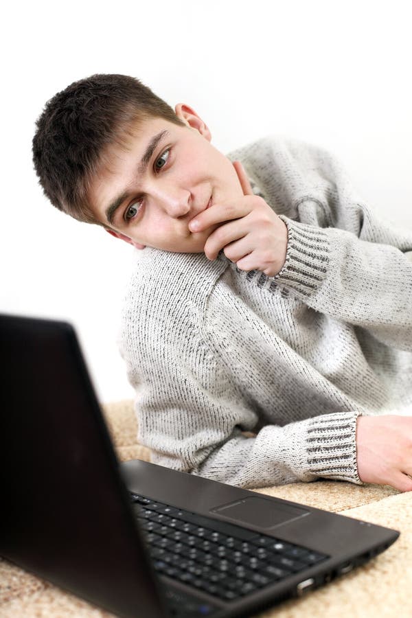 Teenager with notebook stock image. Image of computer - 24590087