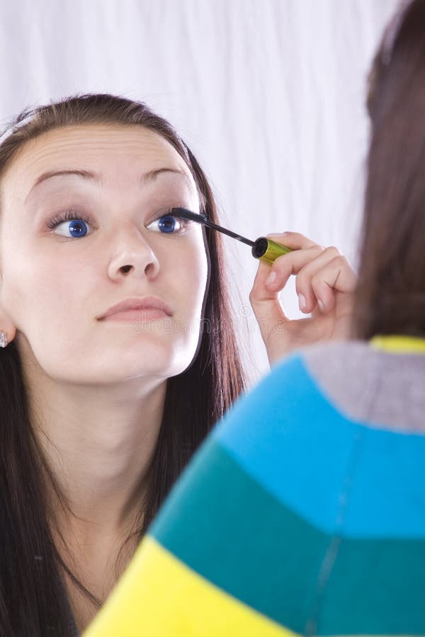 Teenager Putting on Make Up Stock Photo - Image of attractive, brunette ...