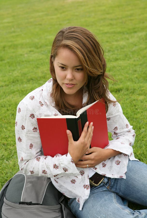 Teenager Reading Book on Grass Stock Image - Image of education ...