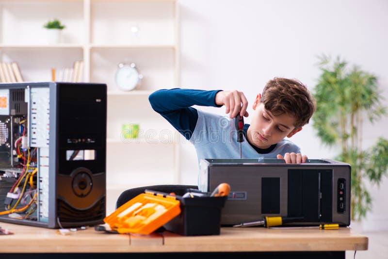 Boy Reparing Computers at Workshop Stock Image - Image of parts ...