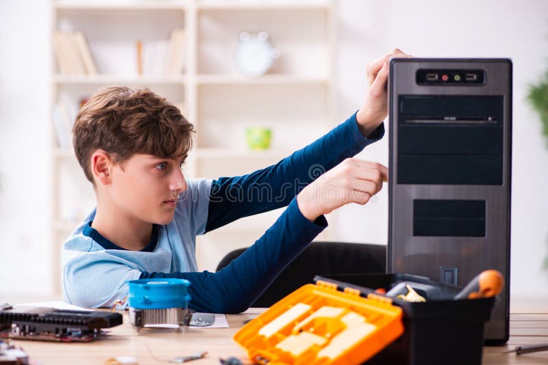 Boy Reparing Computers at Workshop Stock Photo - Image of circuitry ...