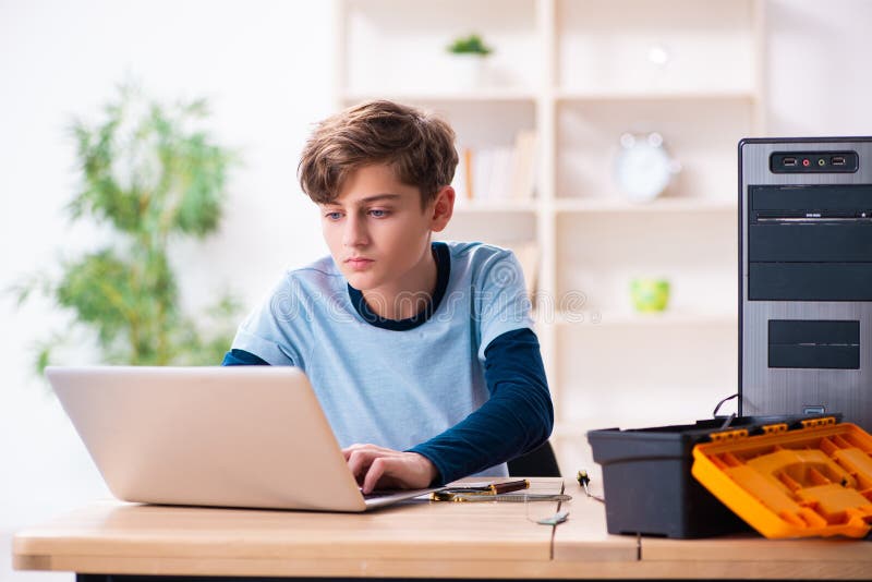 Boy Reparing Computers at Workshop Stock Photo - Image of computer ...