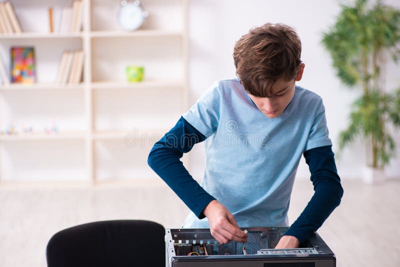 Boy Reparing Computers at Workshop Stock Image - Image of electrician ...
