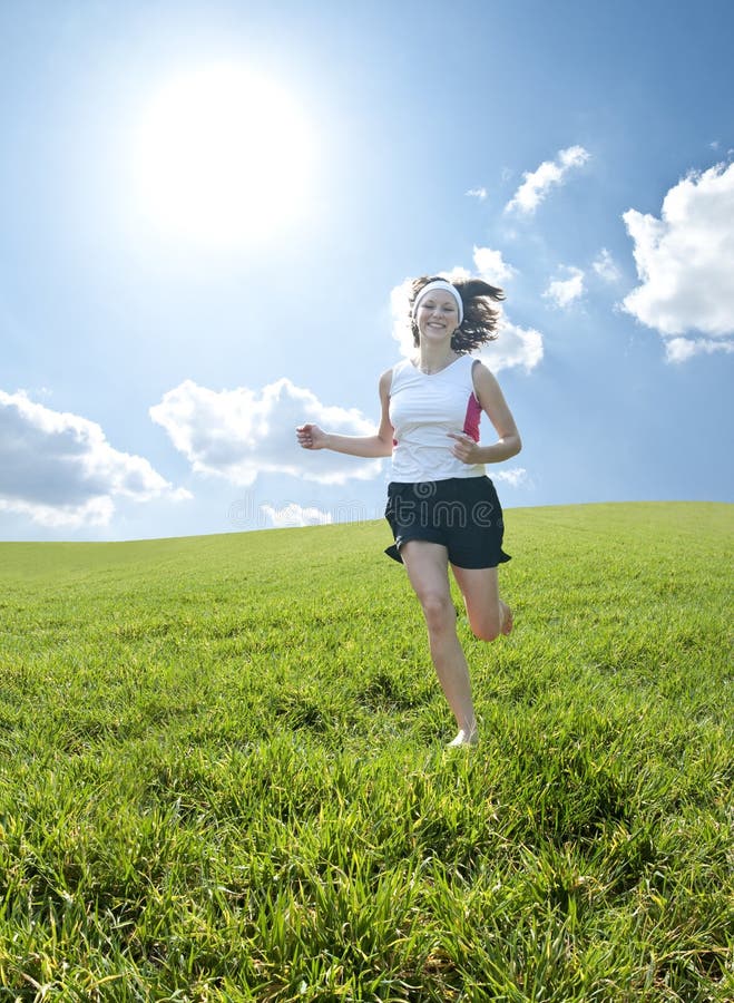 Teenager Running Through Field Stock Photo - Image: 13667946