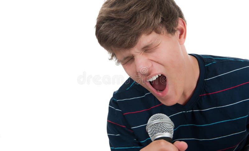 Side View of a Young Man Singing into Microphone Stock Photo - Image of ...