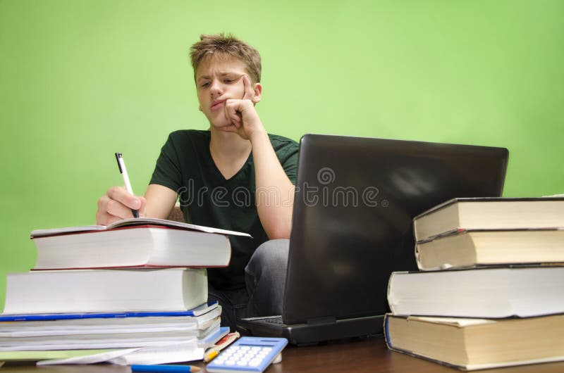 Teenager solving a problem stock photo. Image of green - 50340920