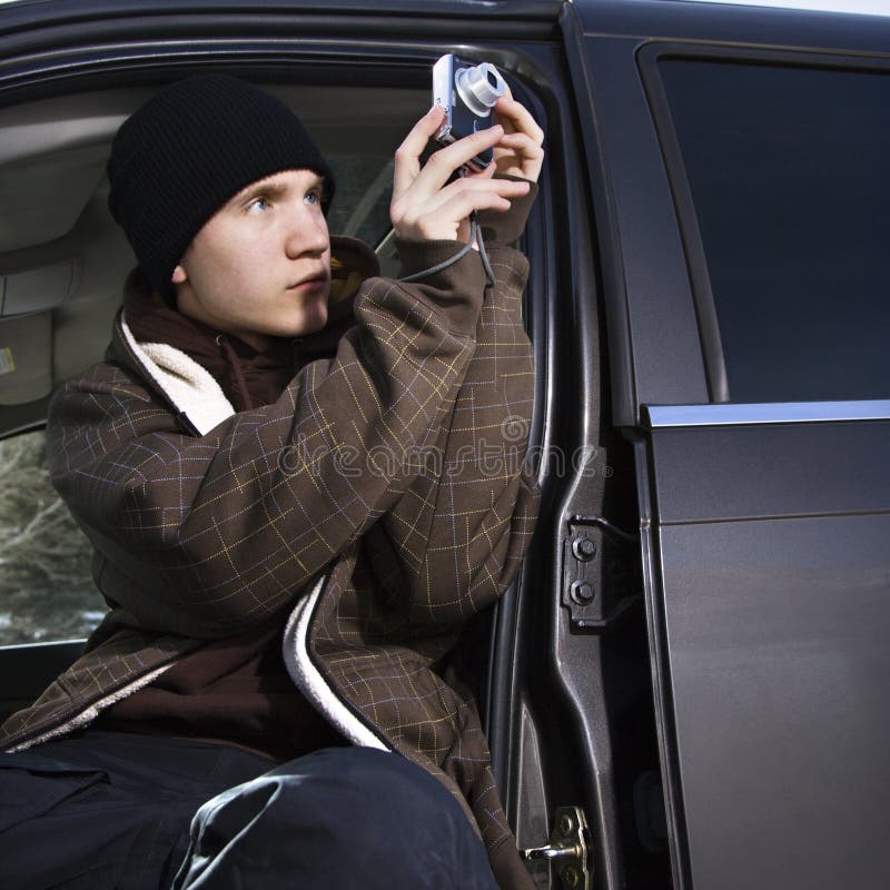 Teenager taking a picture. stock image. Image of hobby - 2769685