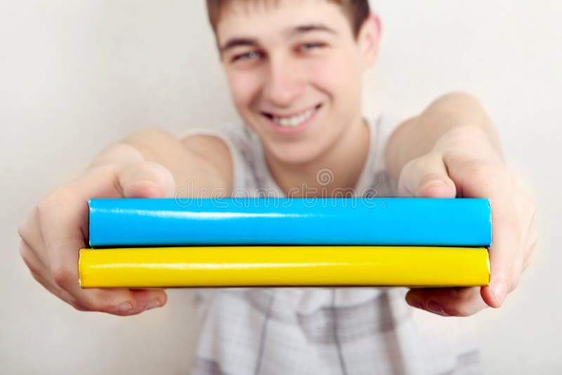 Teenager with Two Books stock image. Image of education - 40986343