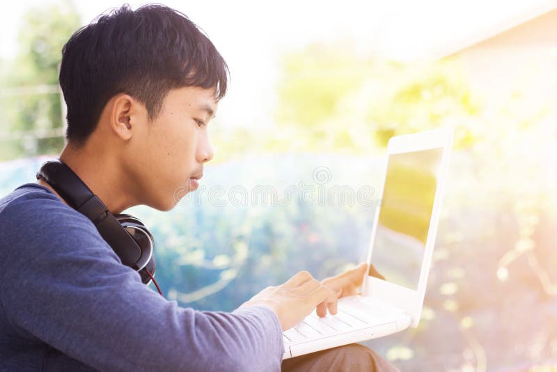 Teenager using laptop stock image. Image of college, lifestyle - 90104377