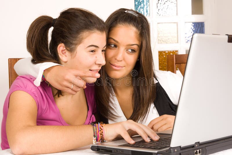 Teenagers with computer stock photo. Image of book, caucasian - 17168614