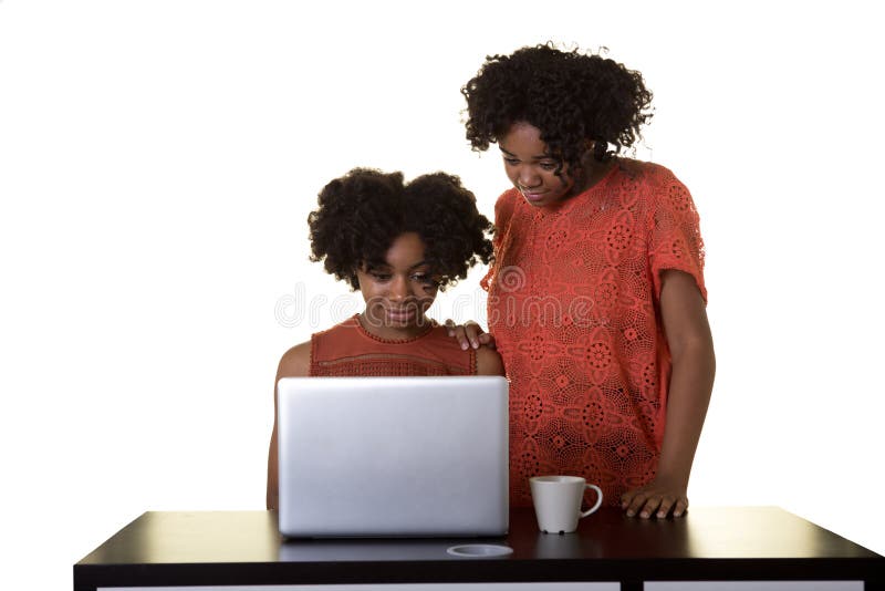 Teenagers at a computer stock photo. Image of people - 61809782
