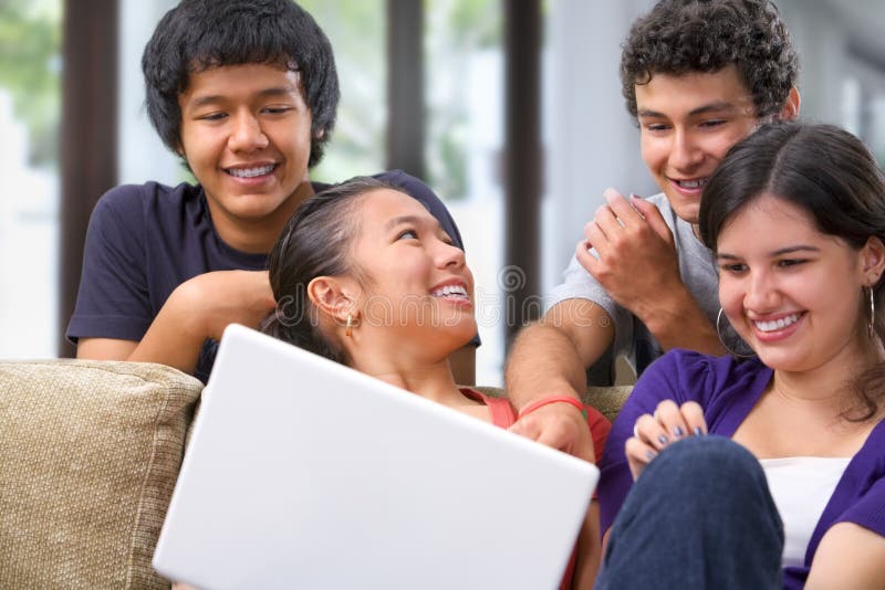 Teenagers Discussing Something on Laptop Stock Photo - Image of student ...