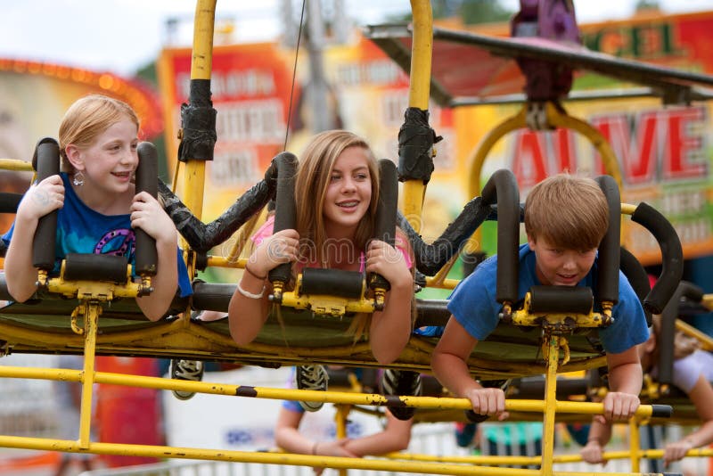 Teens on a Flying Carnival Ride Motion Blur Editorial Stock Photo ...