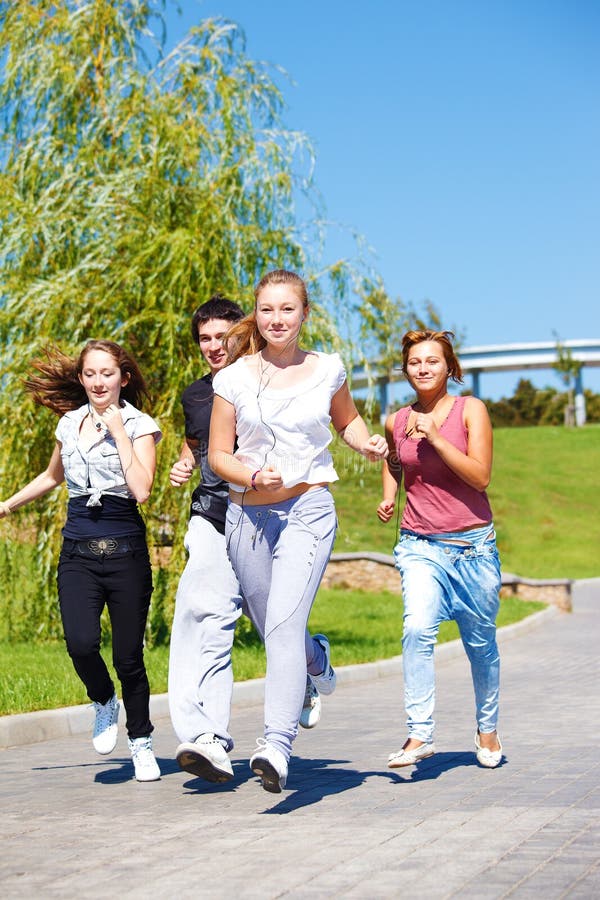 Teenagers Playing Basketball Stock Image - Image of jump, friendship ...